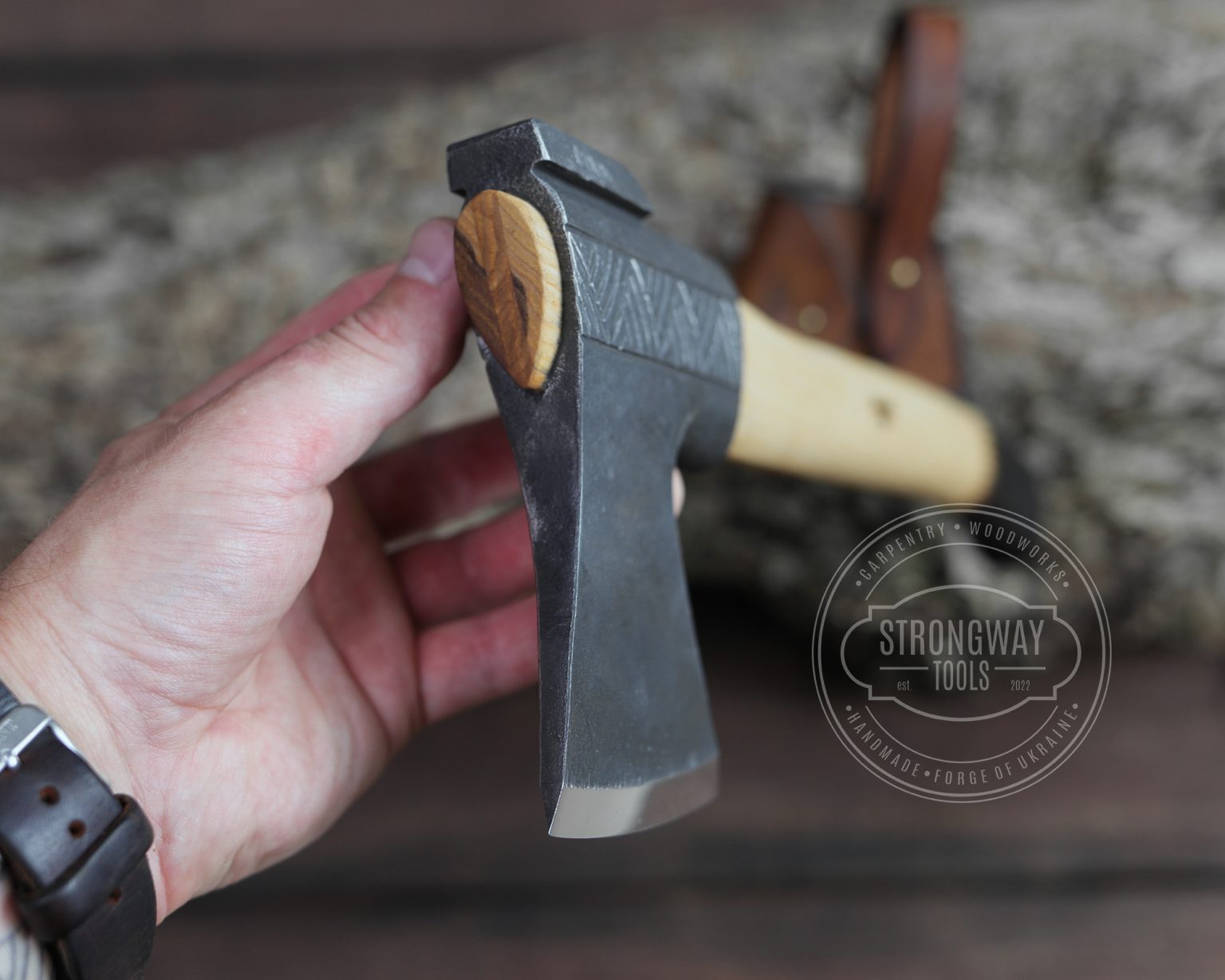 Finnish ax with ornament on the head